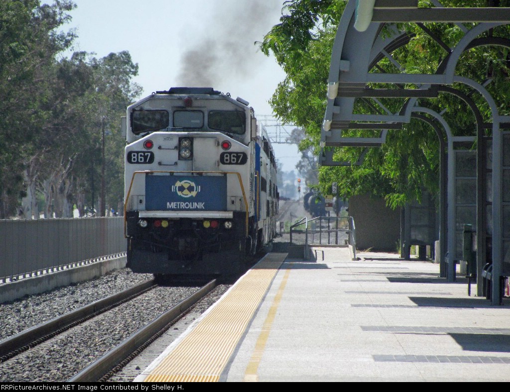 867 taking off out of the station with some smoke